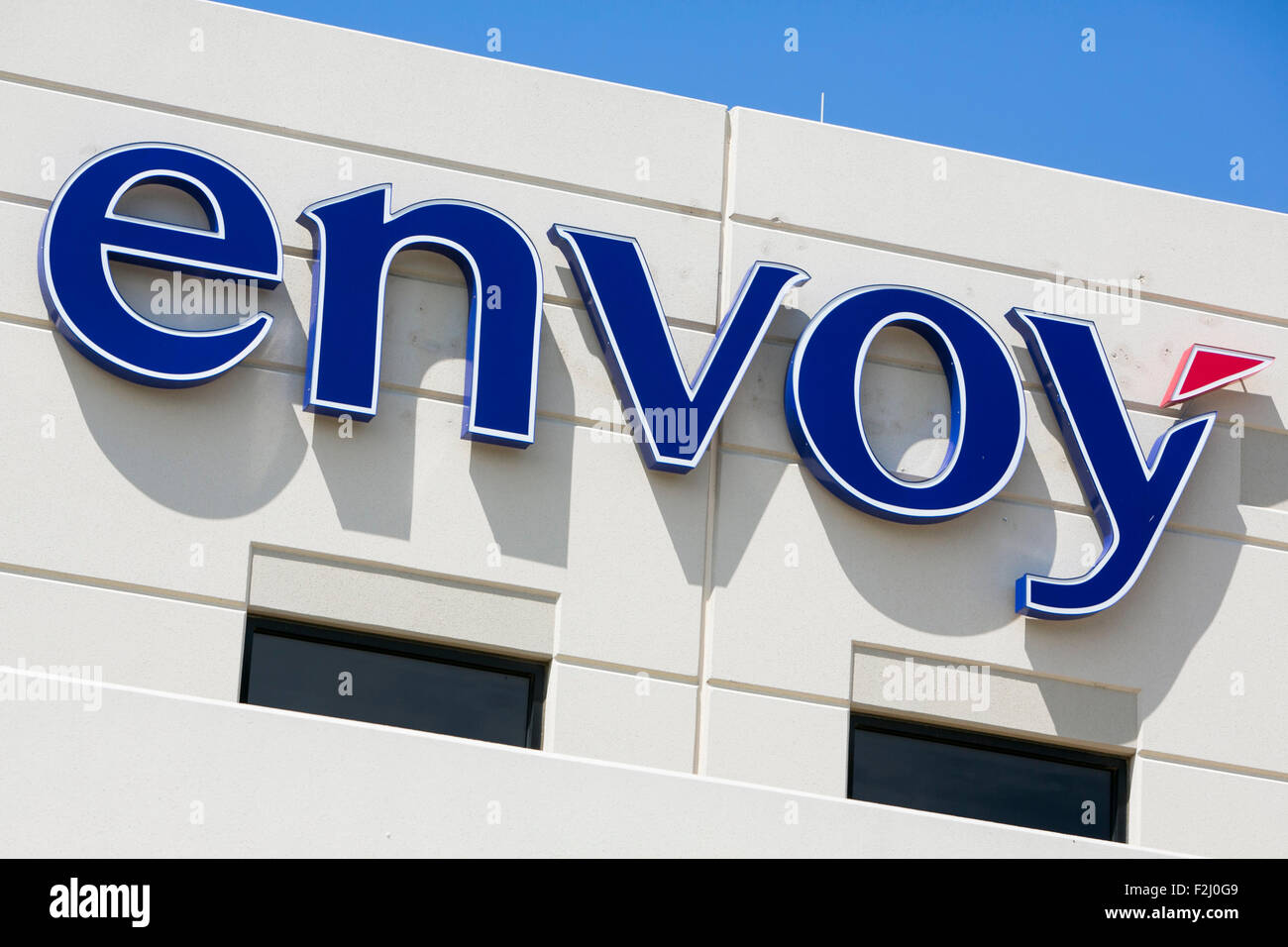 A logo sign outside of the headquarters of Envoy Air Inc., the parent ...