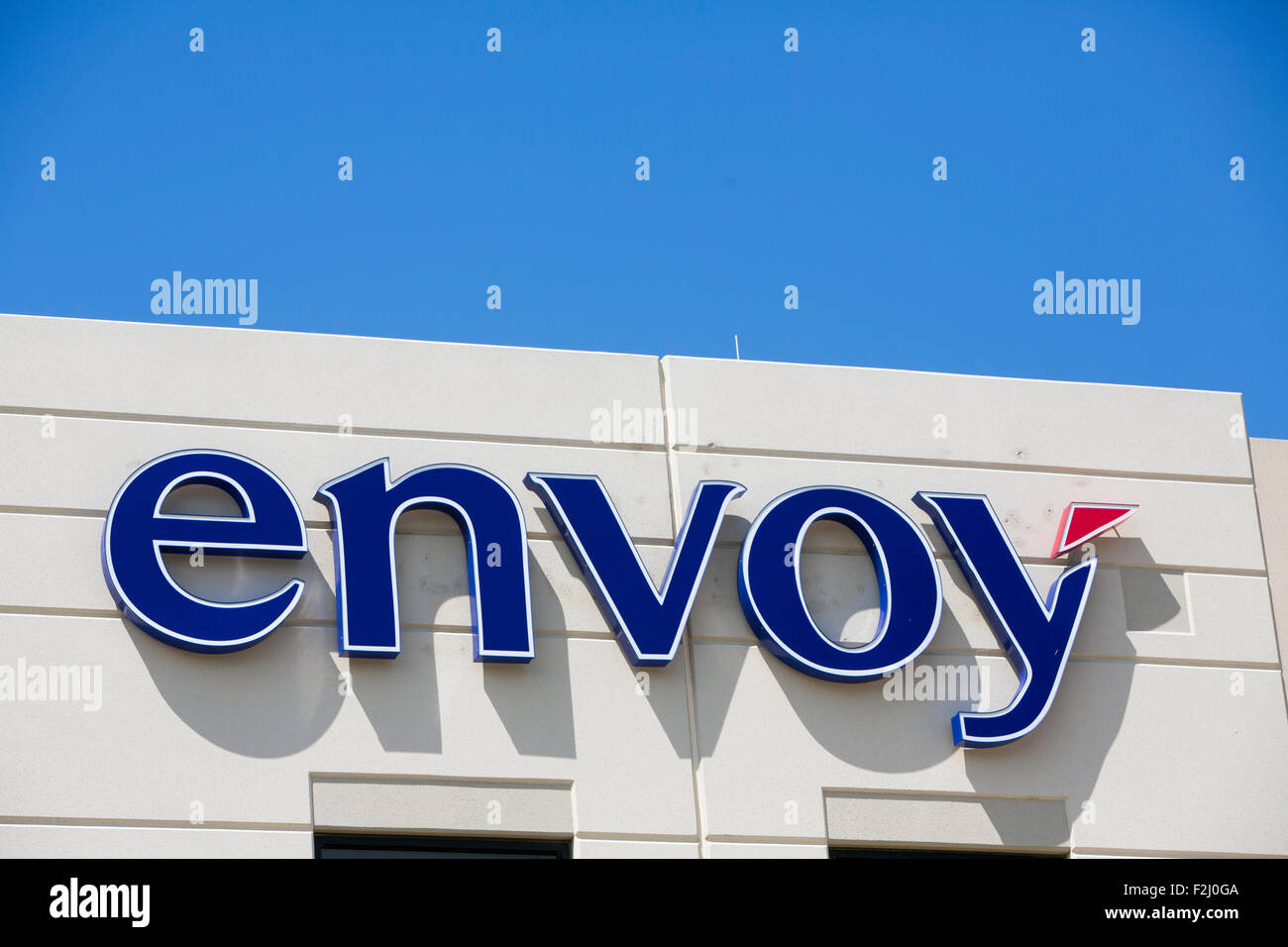 A logo sign outside of the headquarters of Envoy Air Inc., the parent ...