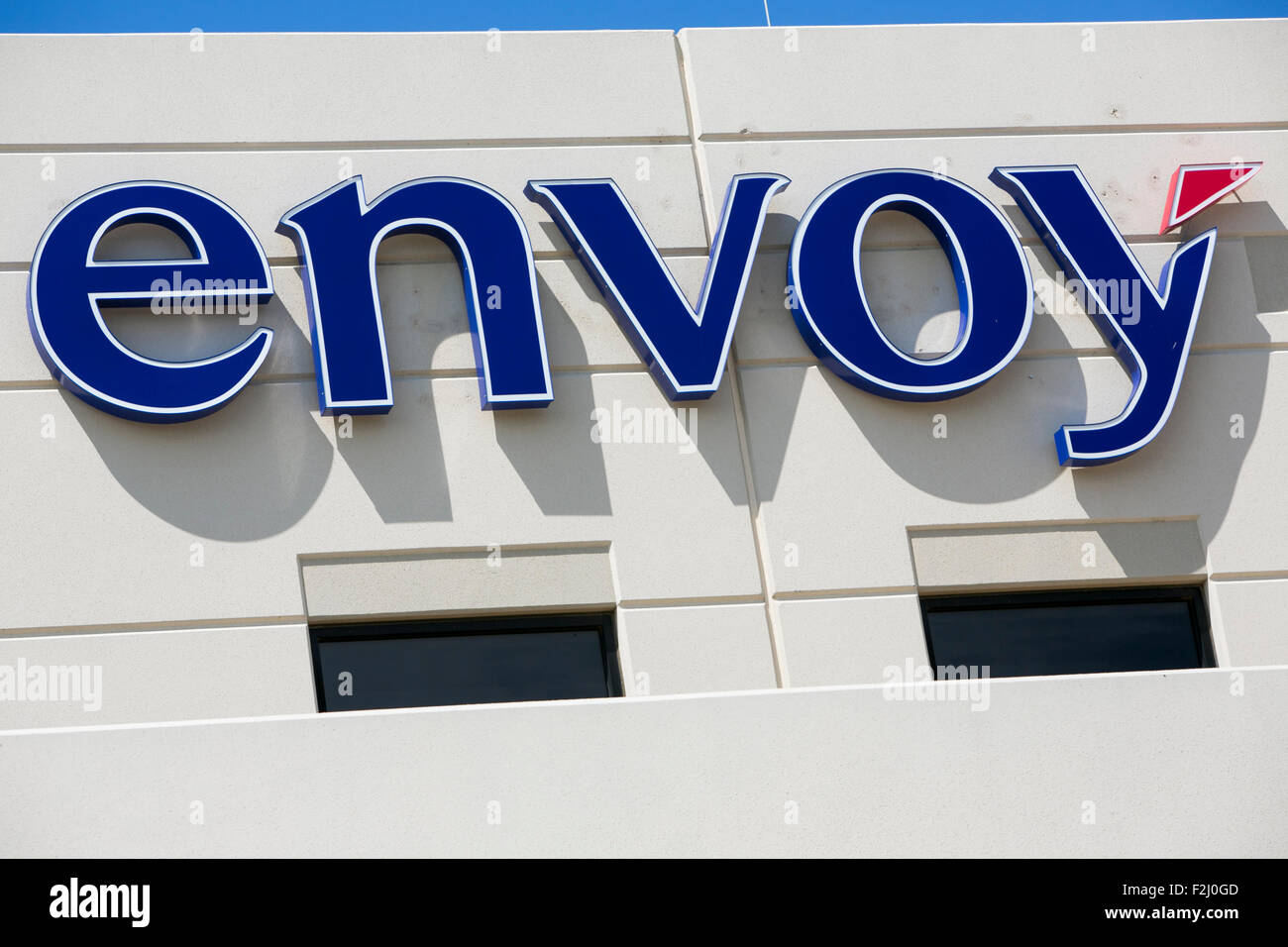 A logo sign outside of the headquarters of Envoy Air Inc., the parent ...