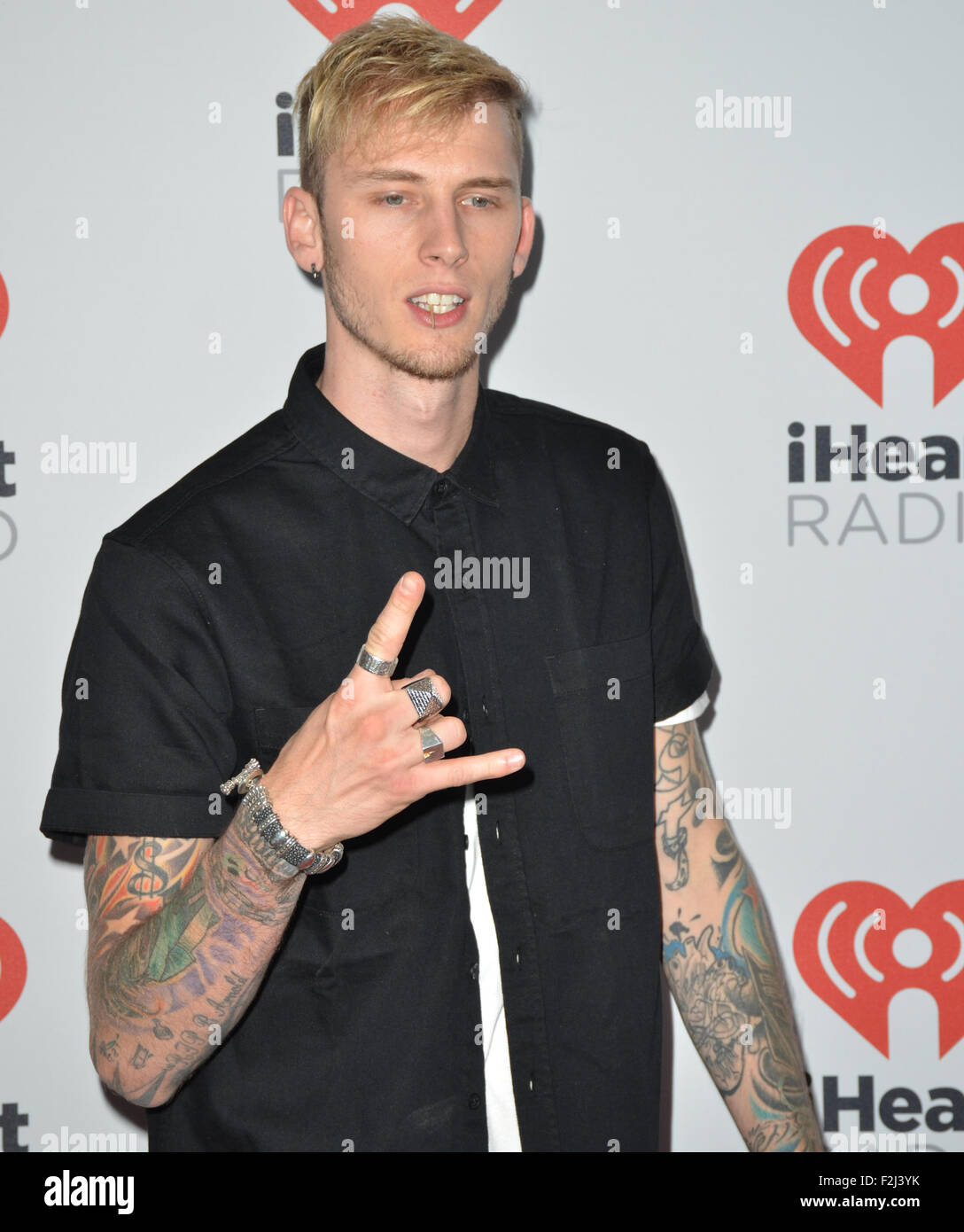 Rapper machine gun kelly attends hi-res stock photography and images ...