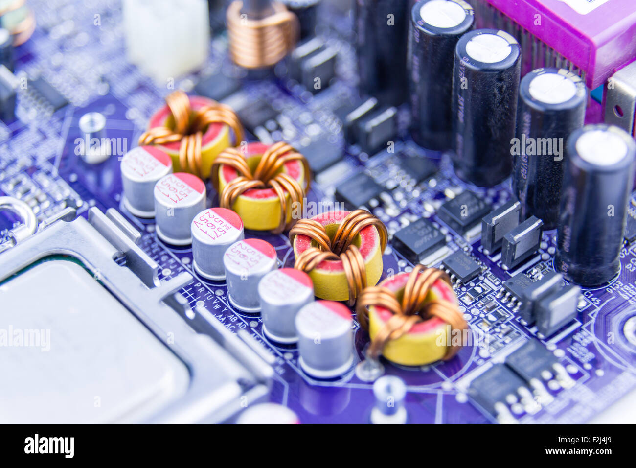Close-up of parts on a computer's motherboard Stock Photo - Alamy