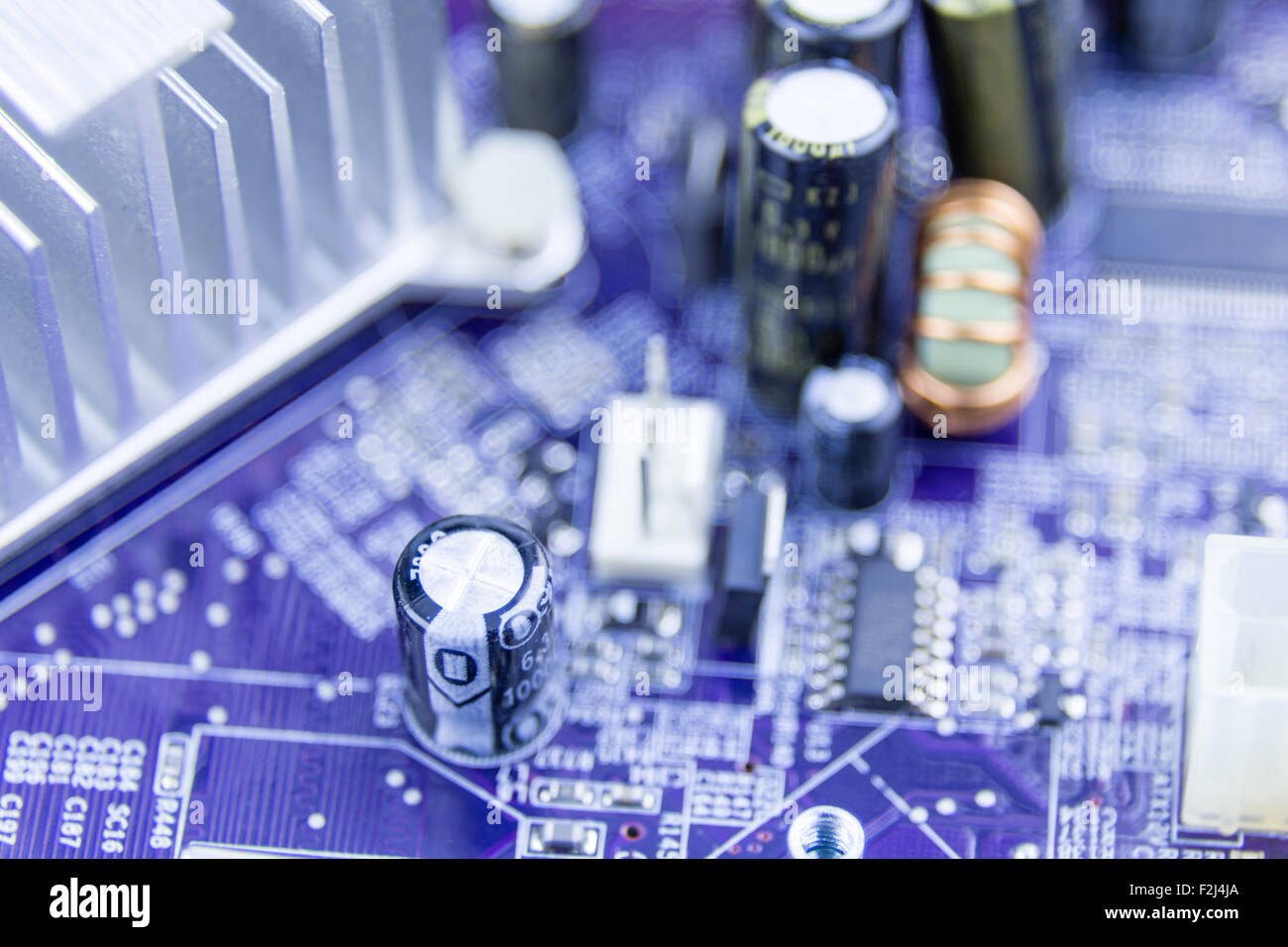 Close-up of parts on a computer's motherboard Stock Photo - Alamy
