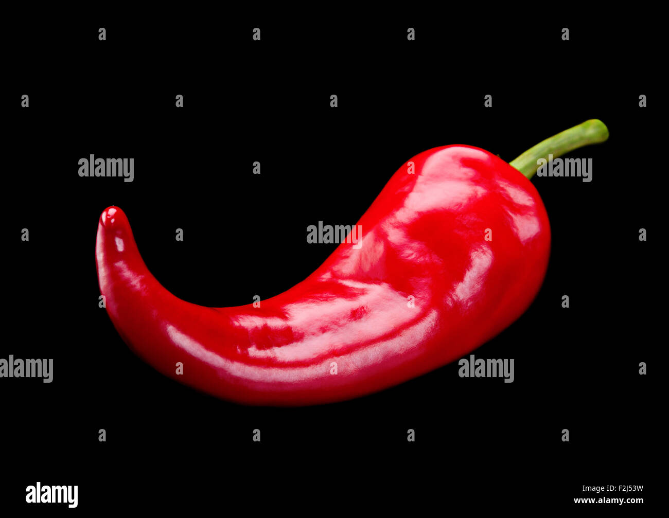 Red chili pepper isolated on black Stock Photo - Alamy