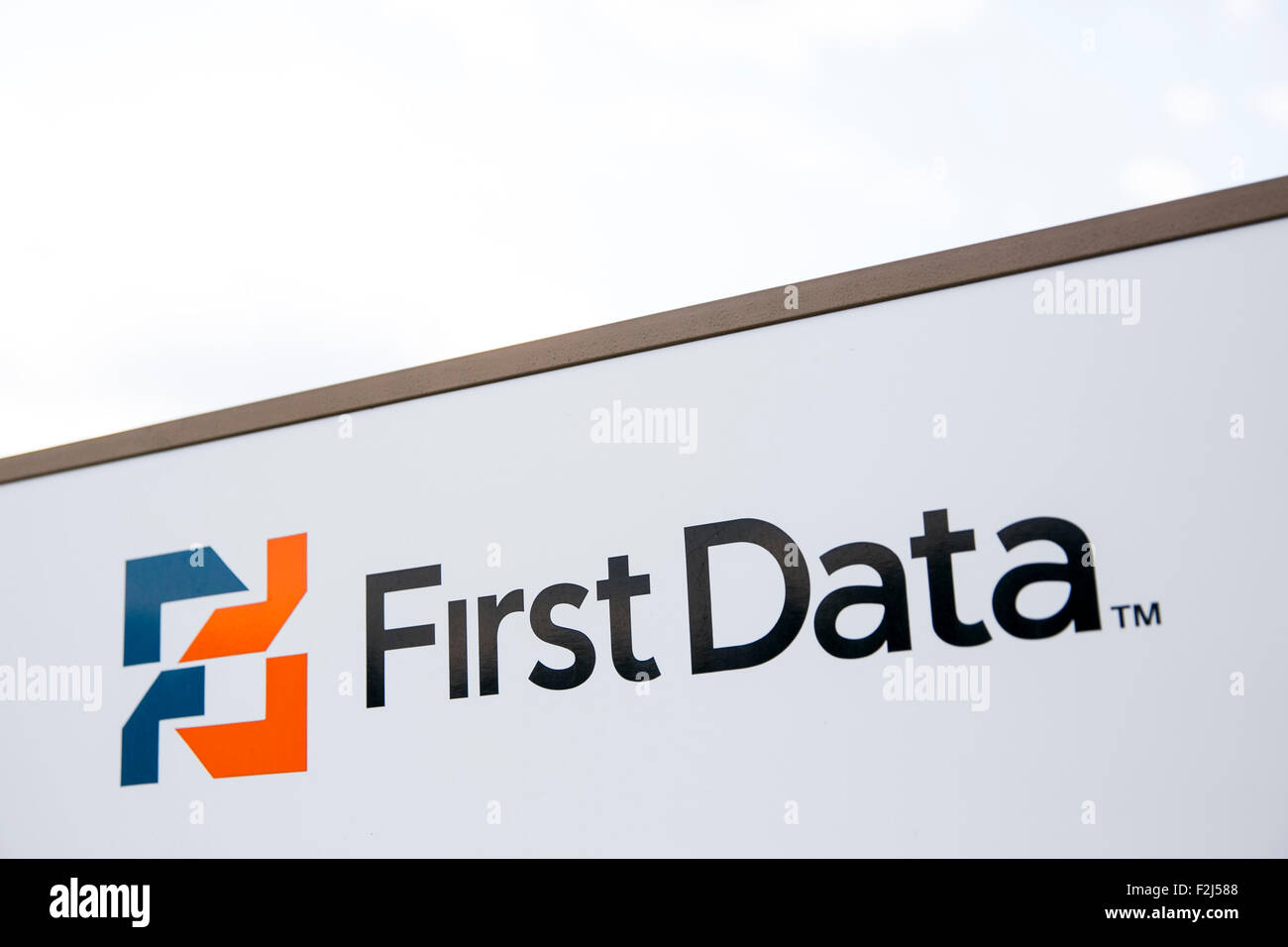 A logo sign outside of a facility occupied by payments processor First ...