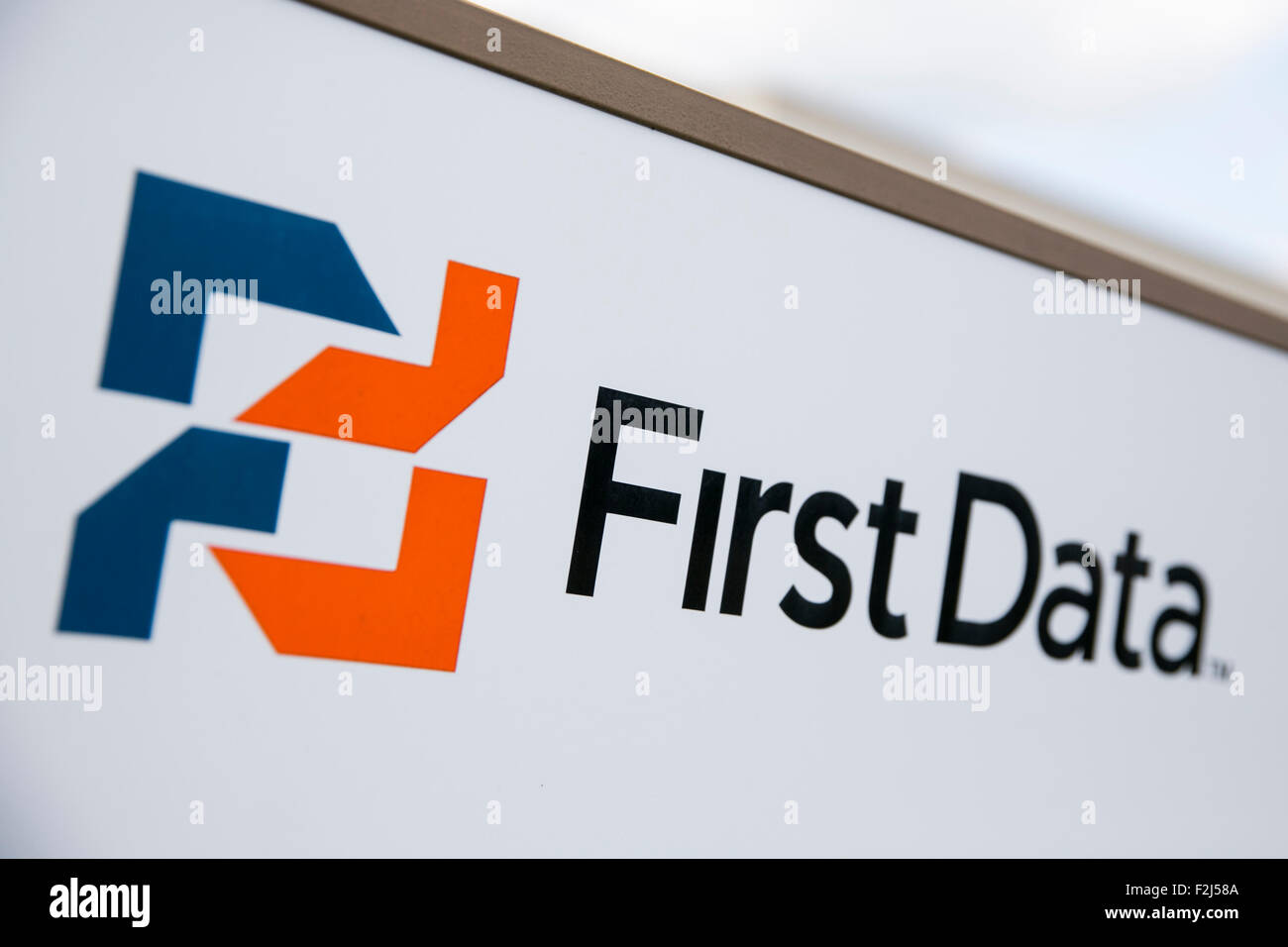 A logo sign outside of a facility occupied by payments processor First ...