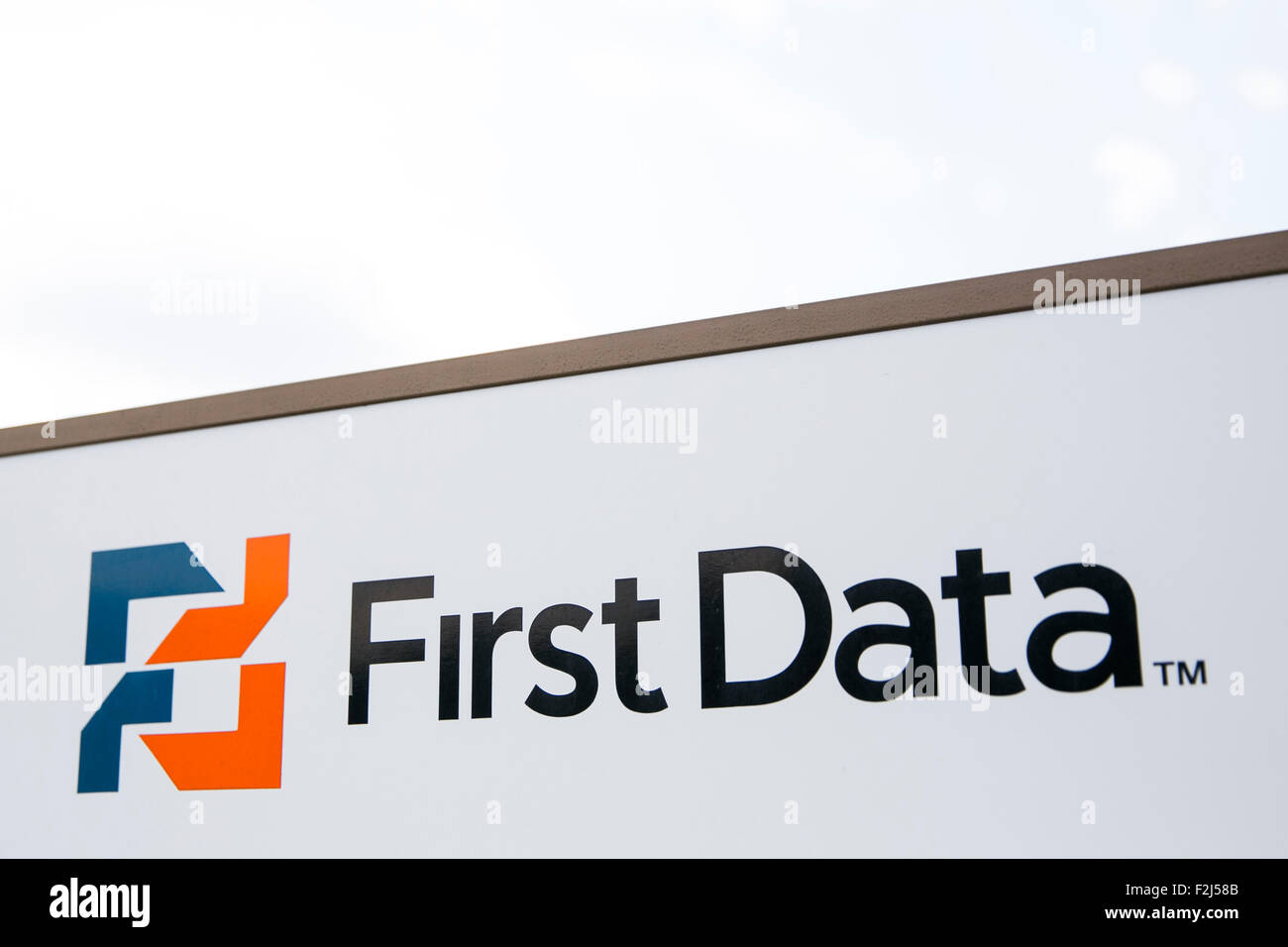 A logo sign outside of a facility occupied by payments processor First ...