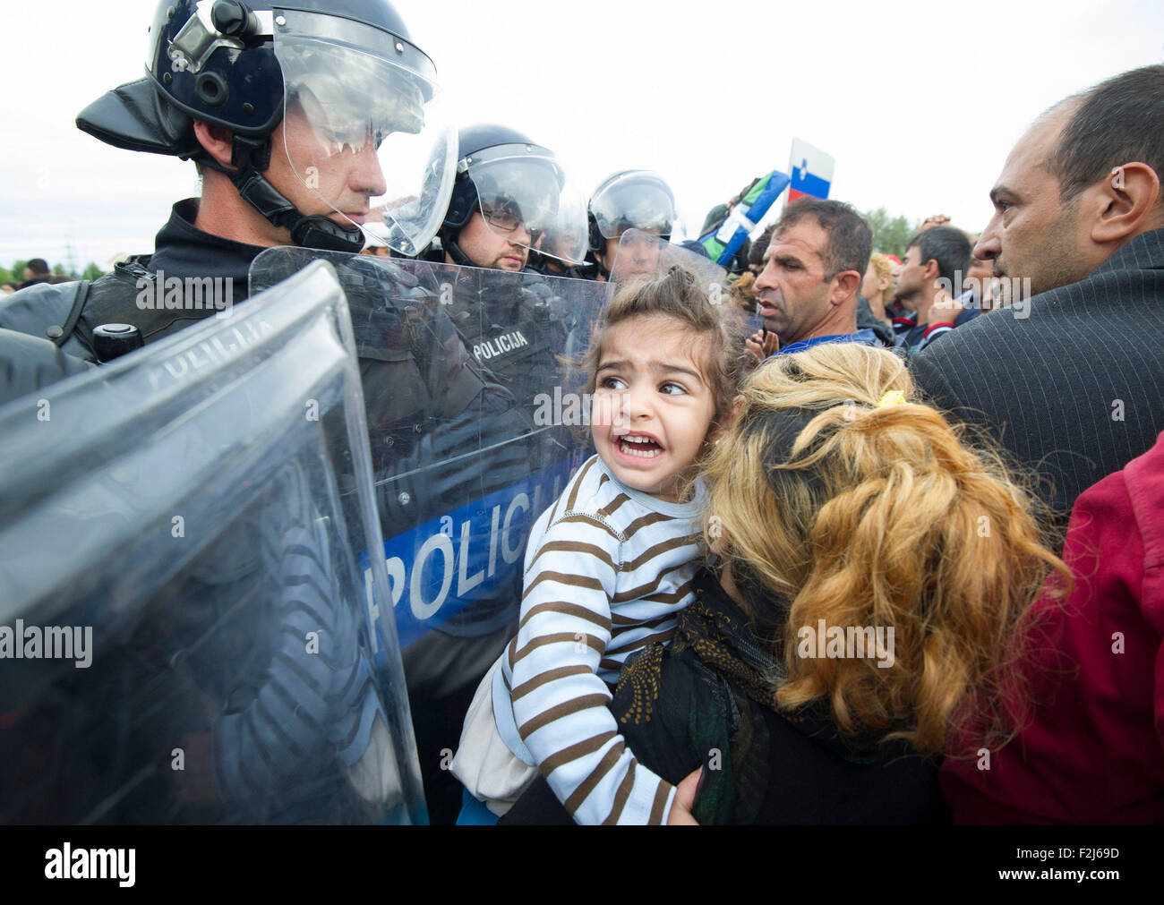 Beijing, Croatia. 19th Sep, 2015. Slovenian riot police block refugees ...