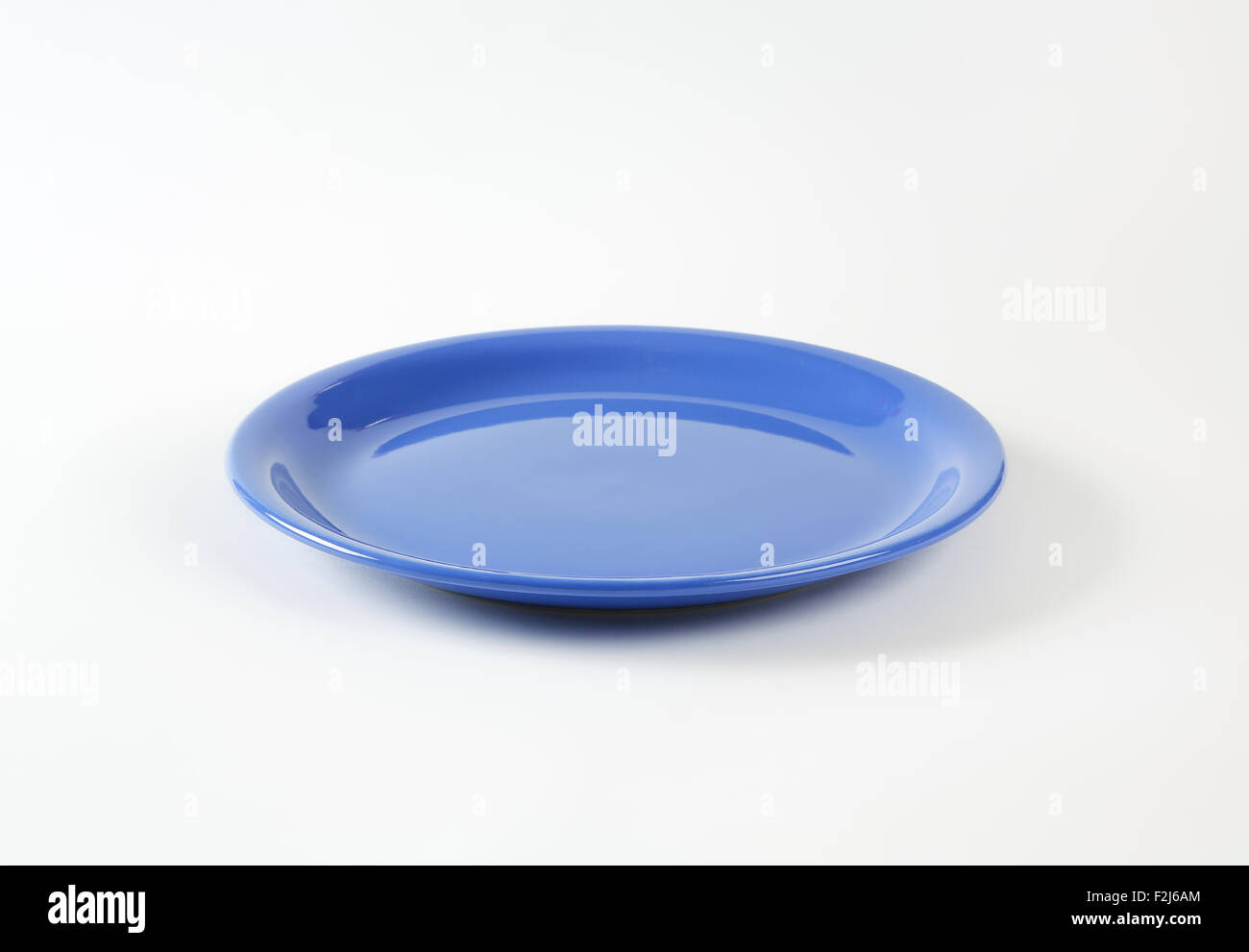 Empty blue plate hi-res stock photography and images - Alamy