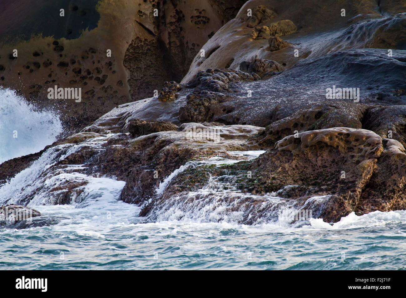 scenic of splashing waves and rocks Stock Photo - Alamy