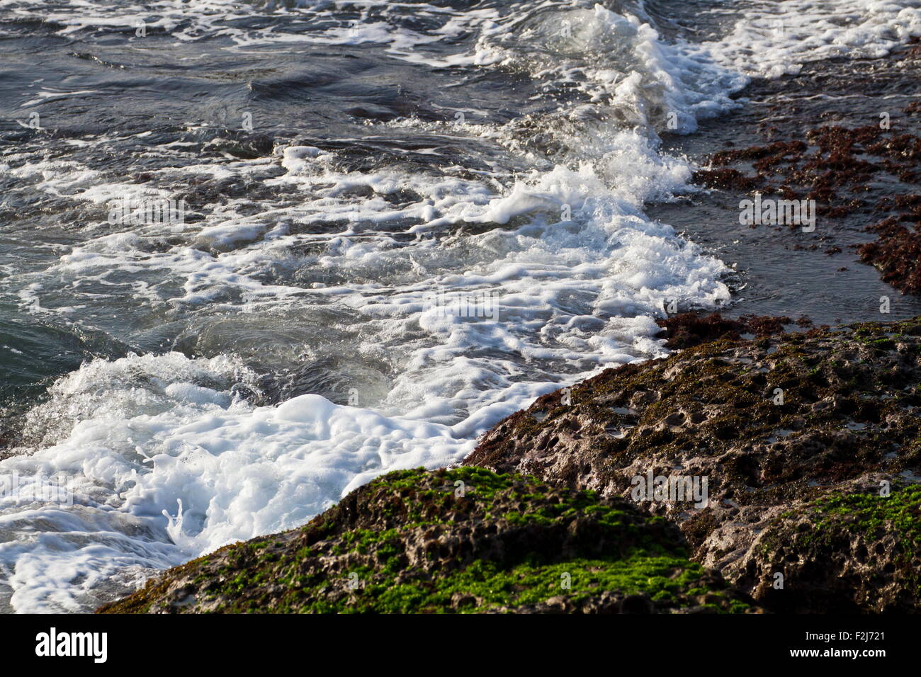 scenic of splashing waves and rocks Stock Photo - Alamy