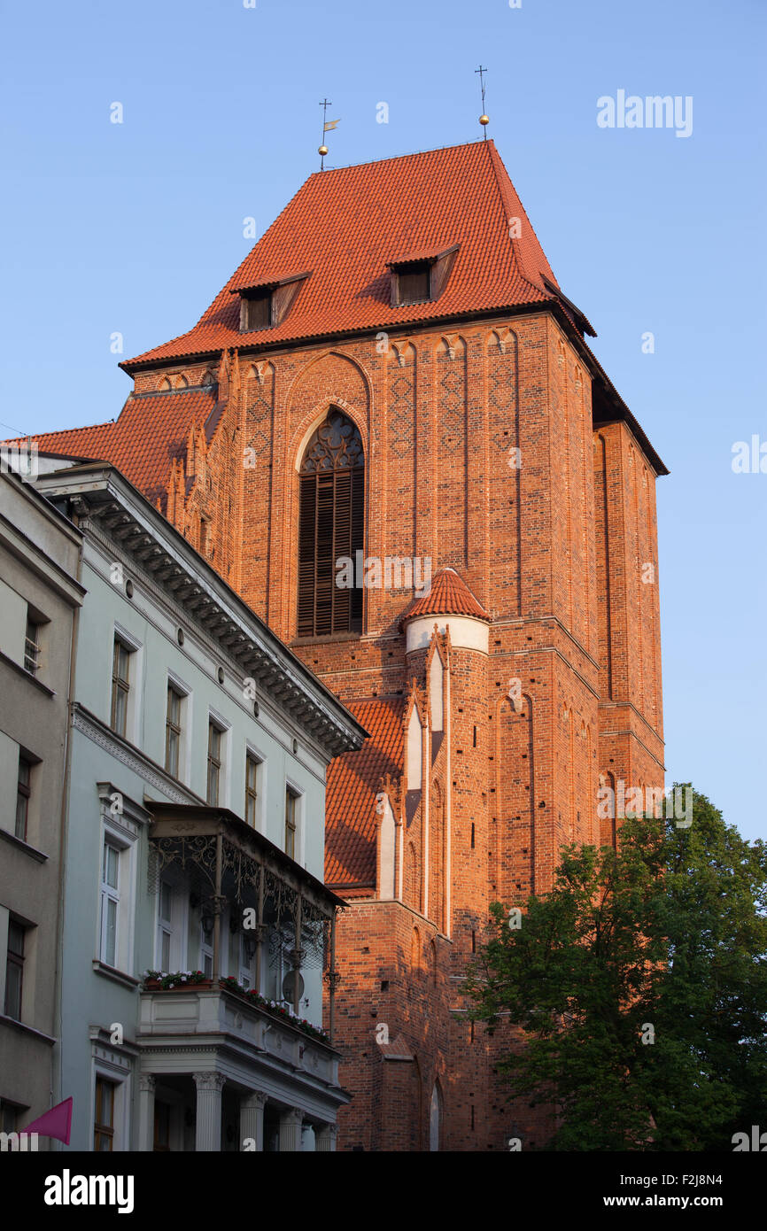 Torun, Poland, sunset at Gothic Cathedral Basilica of St. John the ...