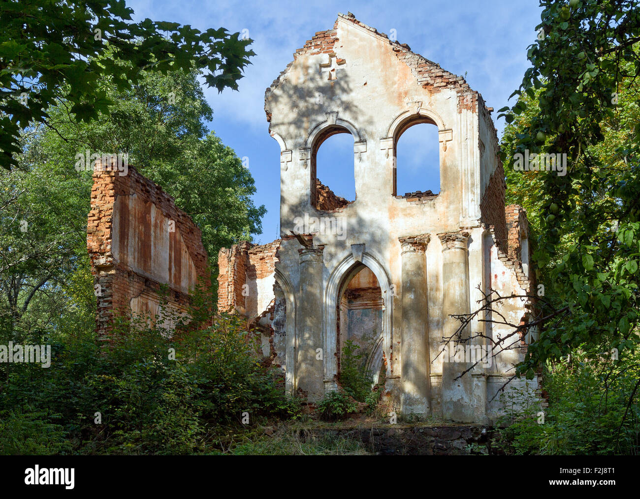 Overgrown ruins of an old manor house Stock Photo - Alamy
