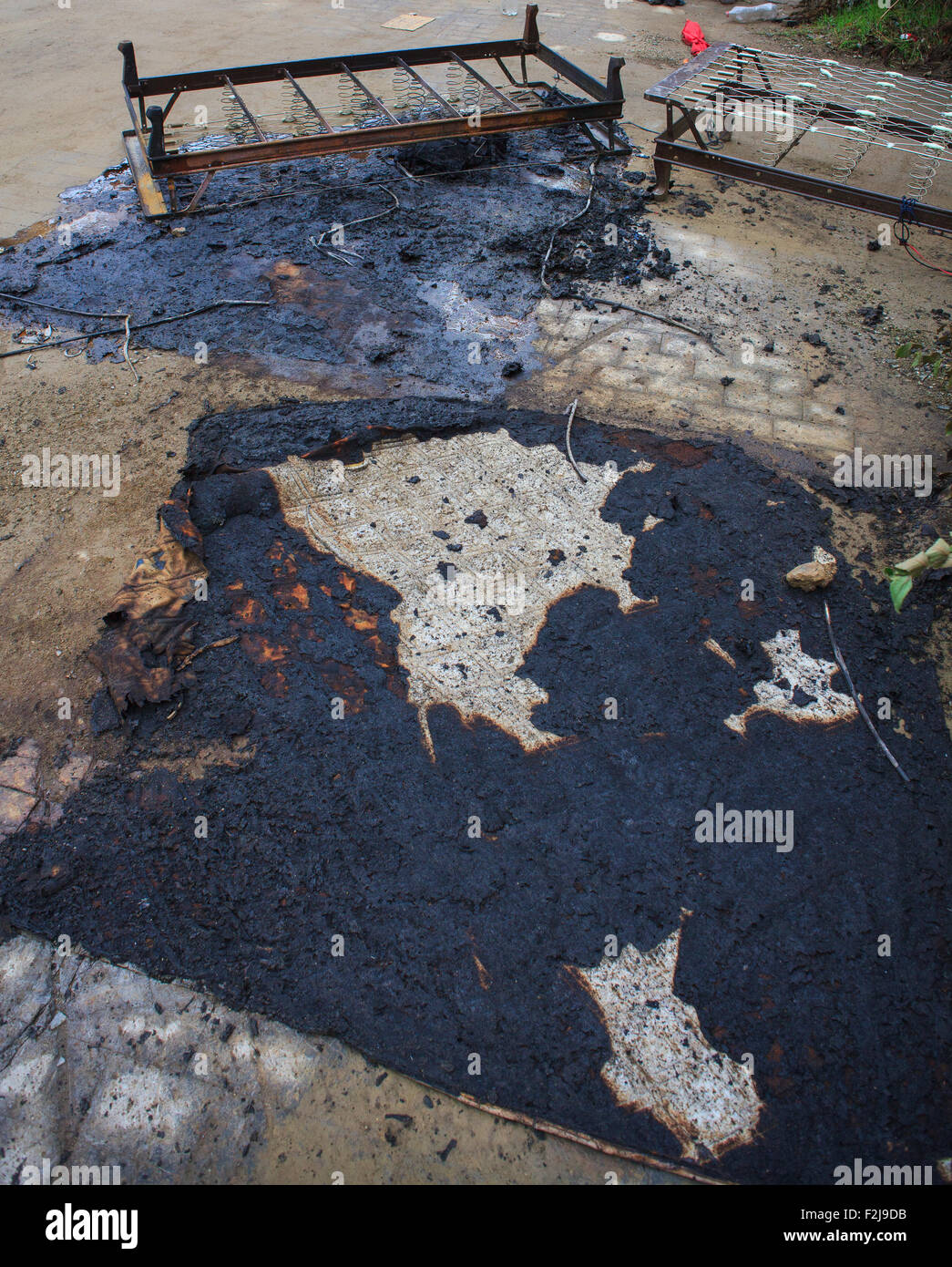View of Burned bed in industrial shed Stock Photo - Alamy