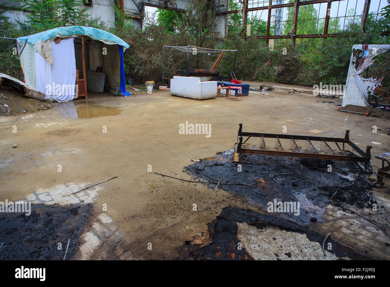 View of Burned bed in industrial shed Stock Photo - Alamy