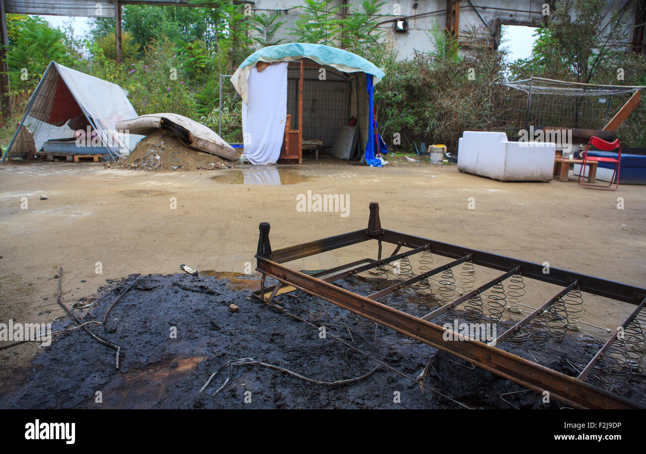 View of Burned bed in industrial shed Stock Photo - Alamy