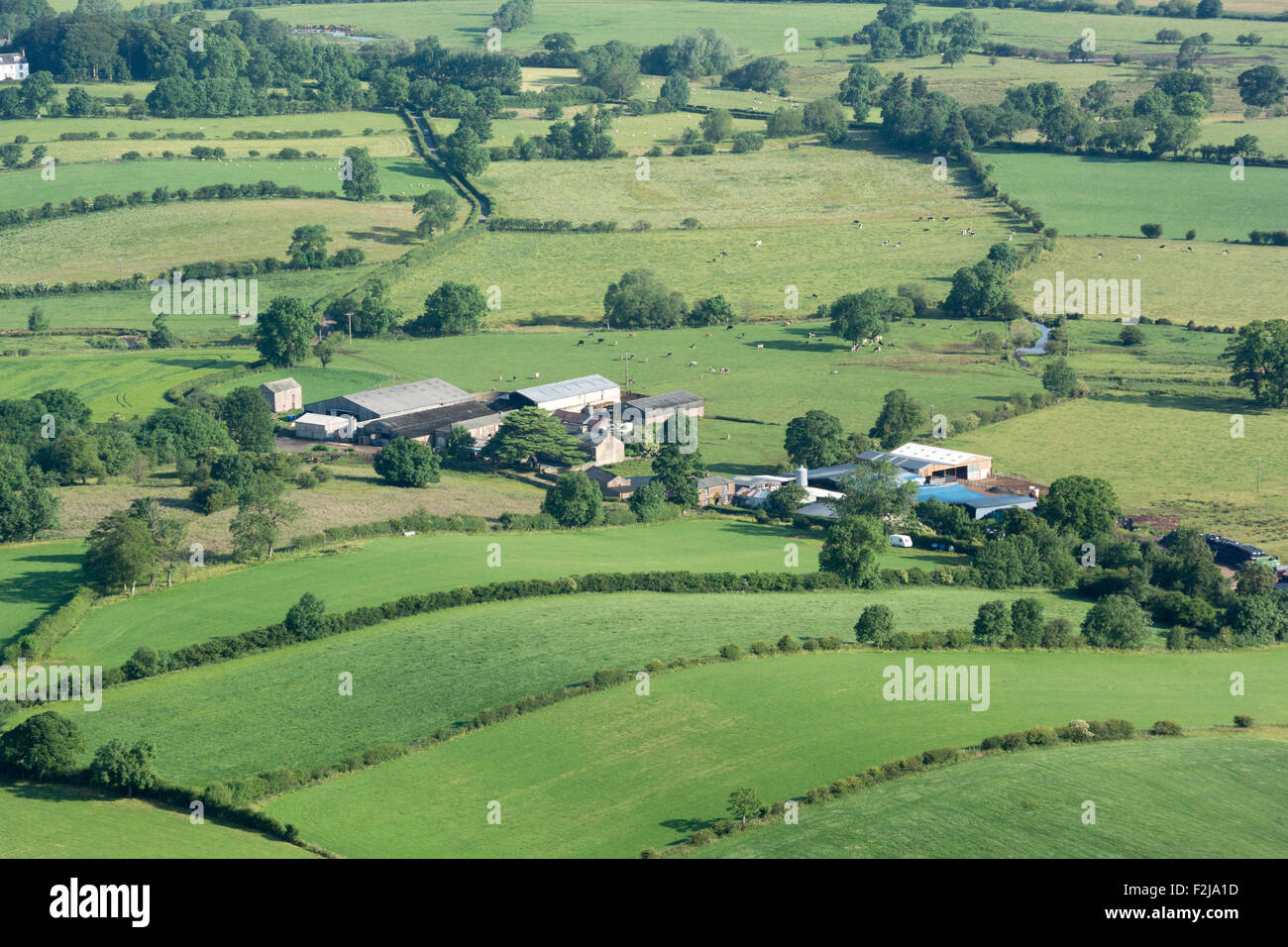 Farm buildings surrounded by countryside, Ormside, Cumbria, UK Stock ...