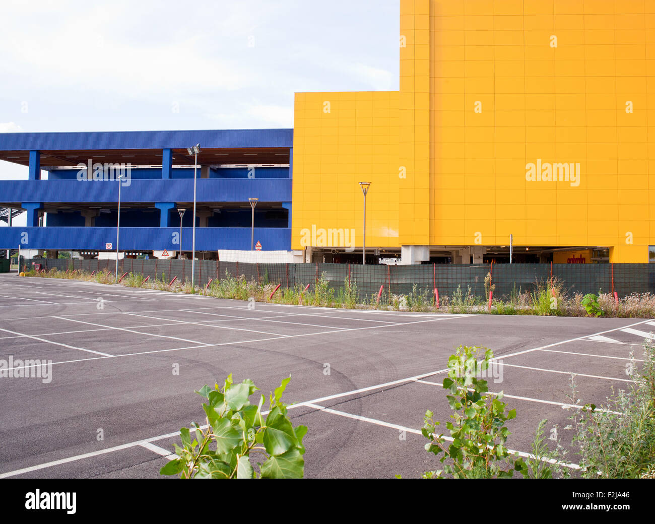 Photo of yellow and blue building Stock Photo - Alamy