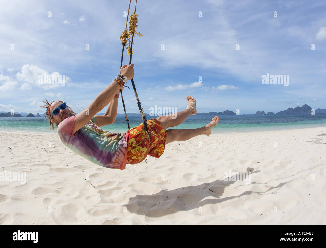 Tropical tree swing hi-res stock photography and images - Alamy