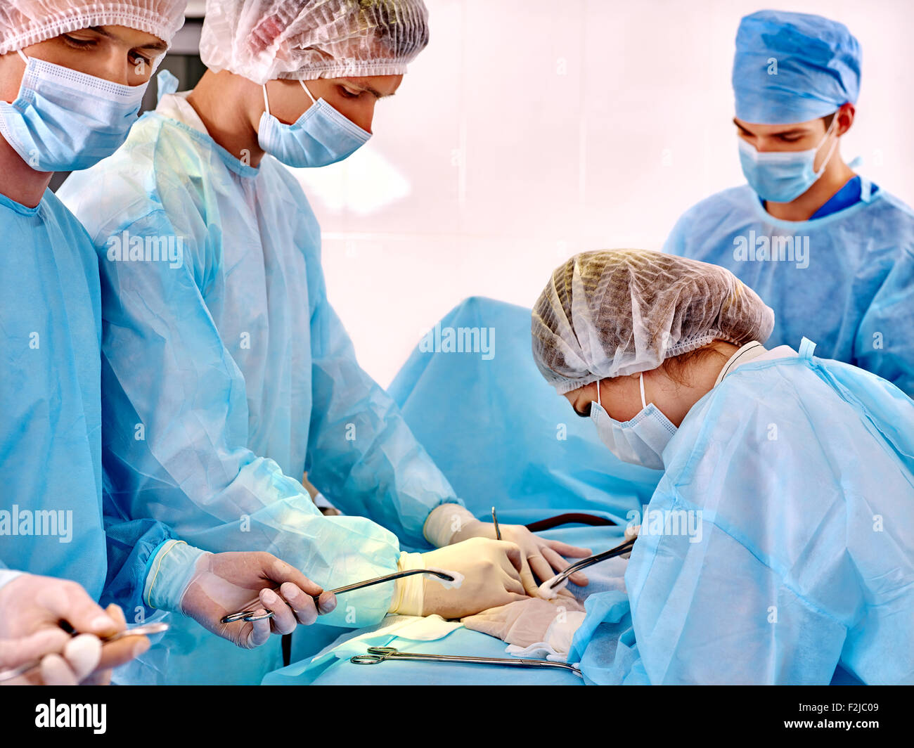 Surgeon at work in operating room Stock Photo - Alamy