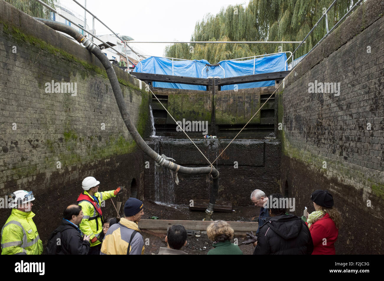 Renovation work on the Camden Lock gates showing the drained lock on ...