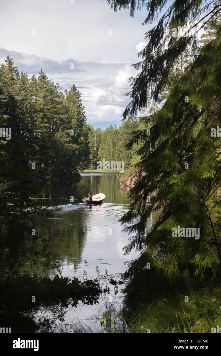 Small boat on Swedish lake, Glaskogen Nature Reserve, Varmland, Sweden ...