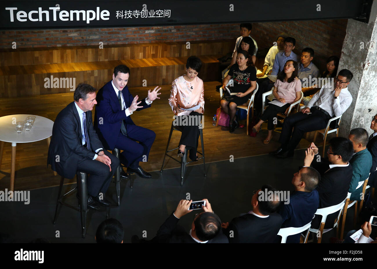 Beijing, China. 20th Sep, 2015. British Chancellor of the Exchequer George Osborne (2nd L) talks ...