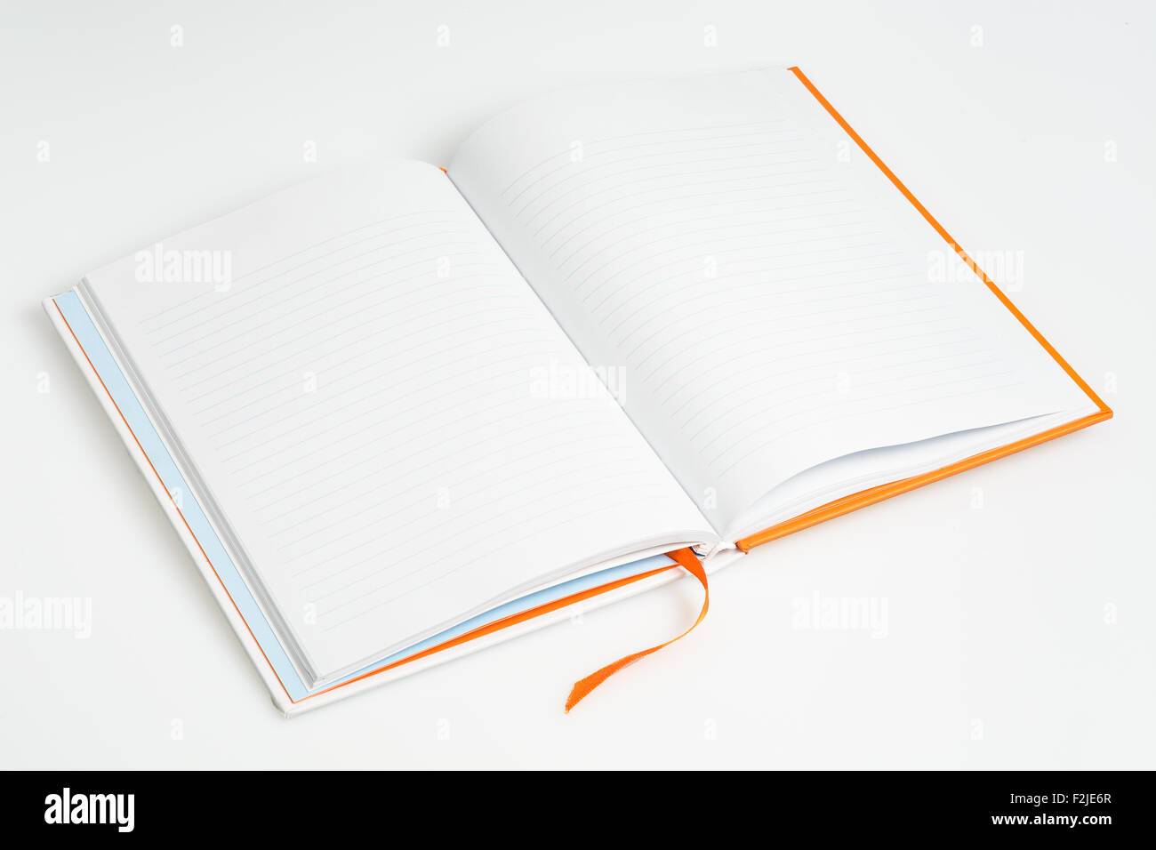 Open a blank white note book on white background Stock Photo - Alamy