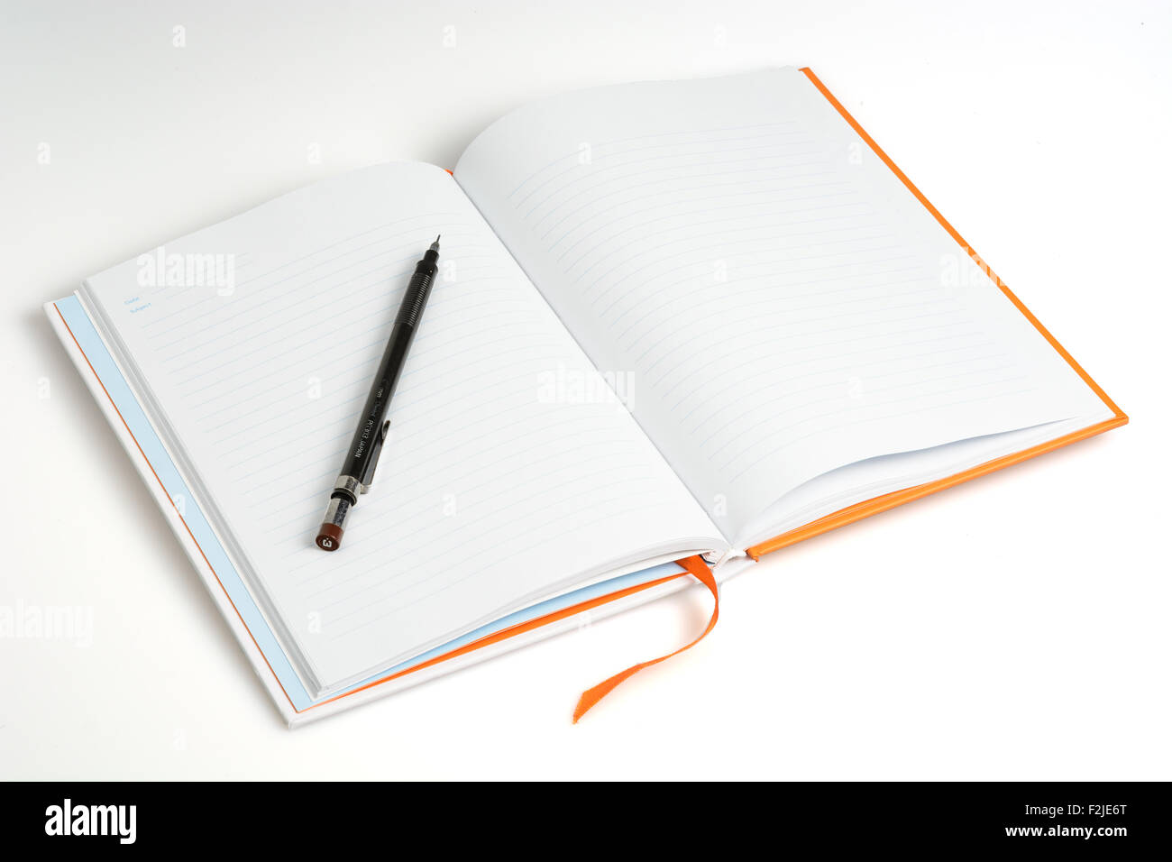 Open a blank white notebook and pen on white background Stock Photo - Alamy