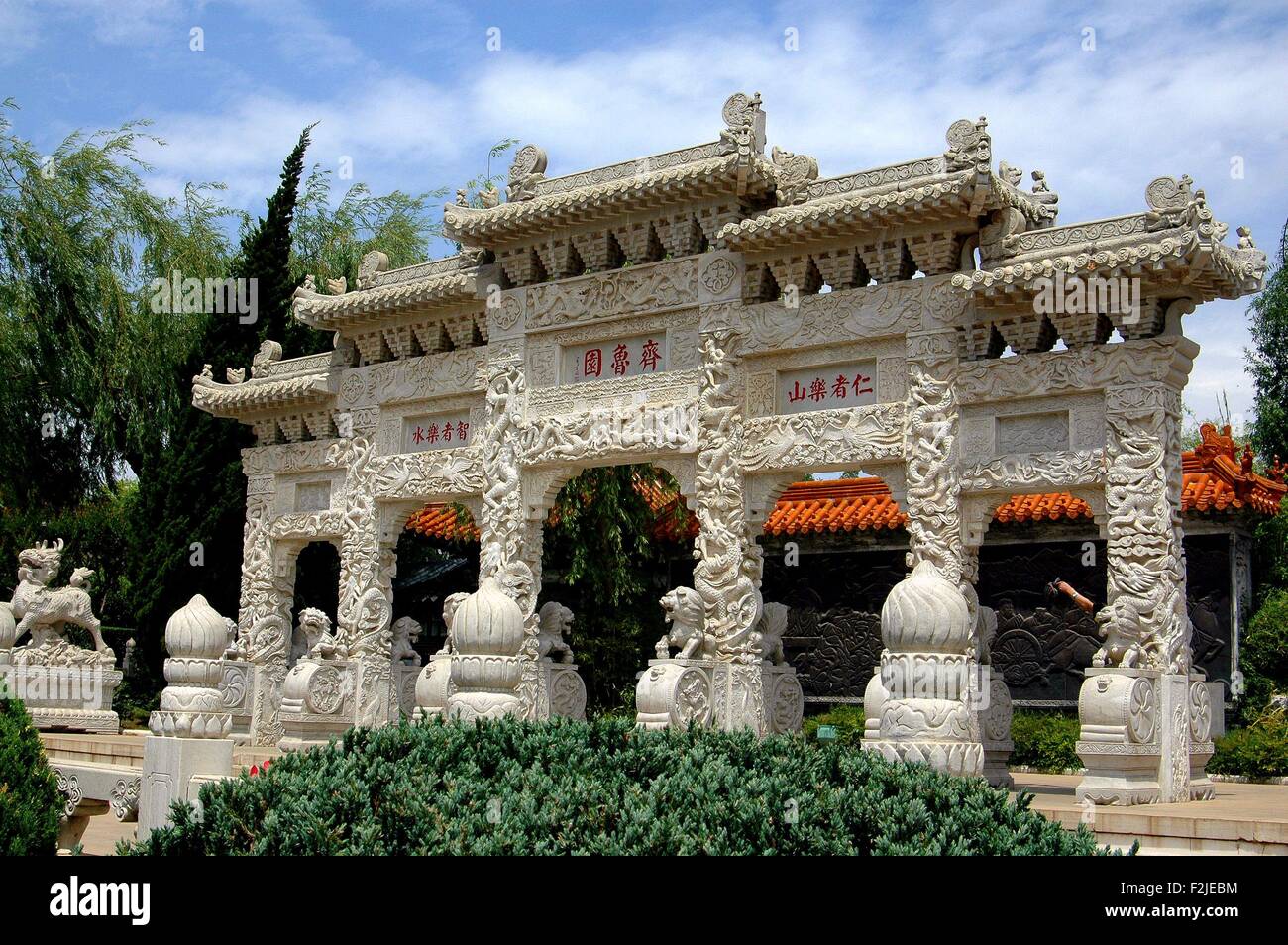 Kunming, China: Lion Gateway with multiple carved figures at the Hui ...