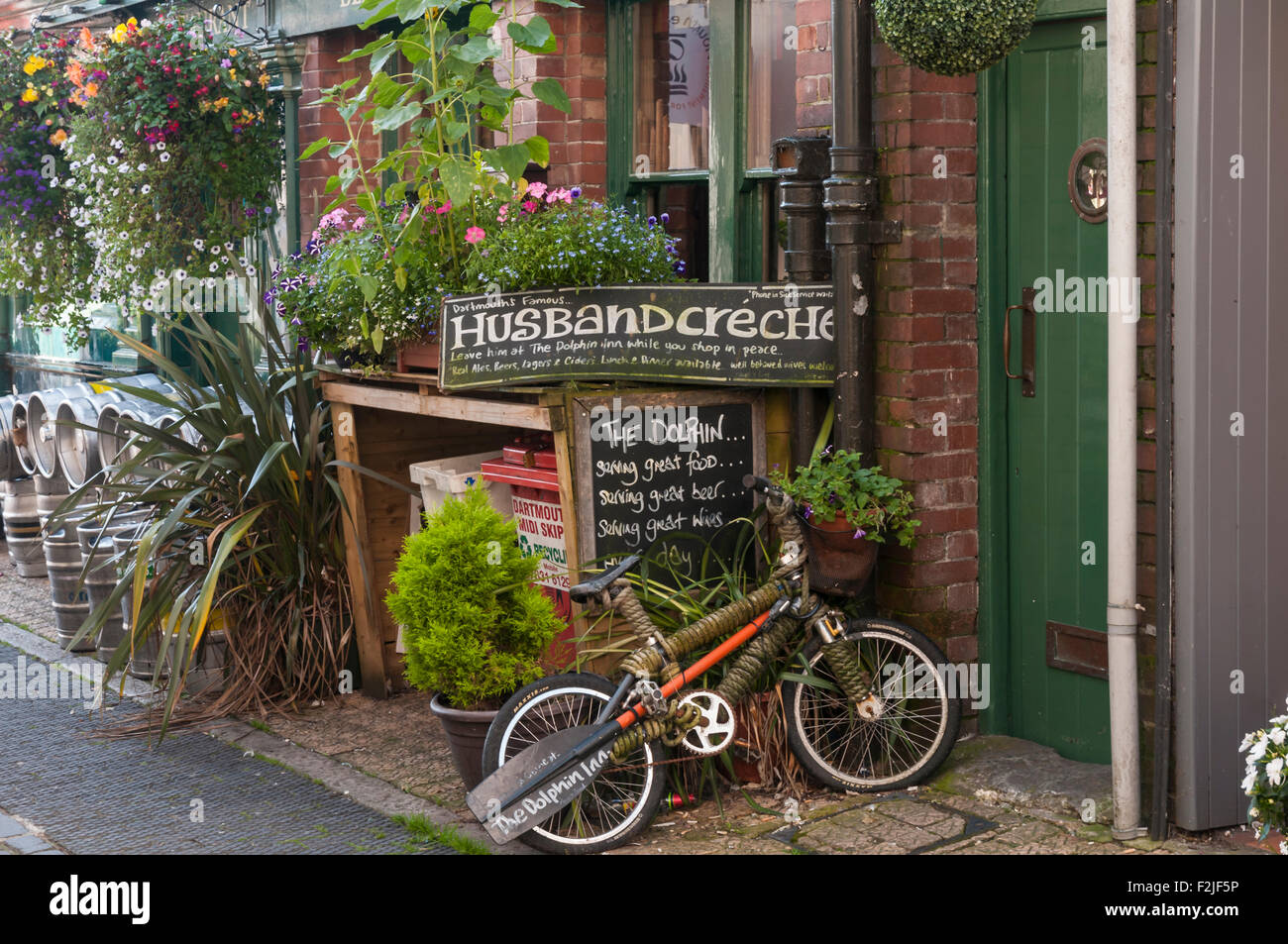 The husband creche, The Dolphin Pub, in Dartmouth, Devon, England Stock ...
