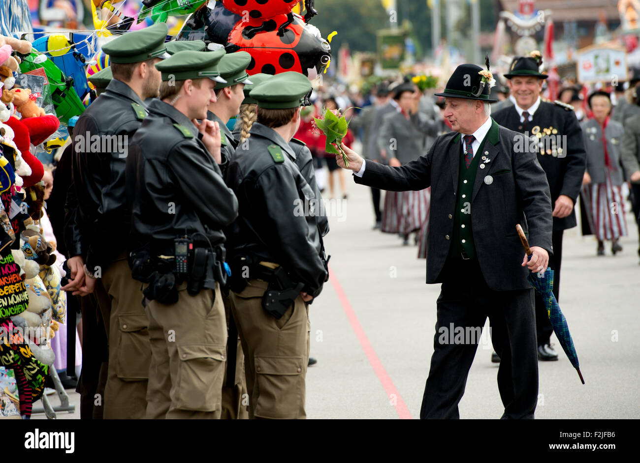Munich, Germany. 20th Sep, 2015. Police officers watch the traditional ...