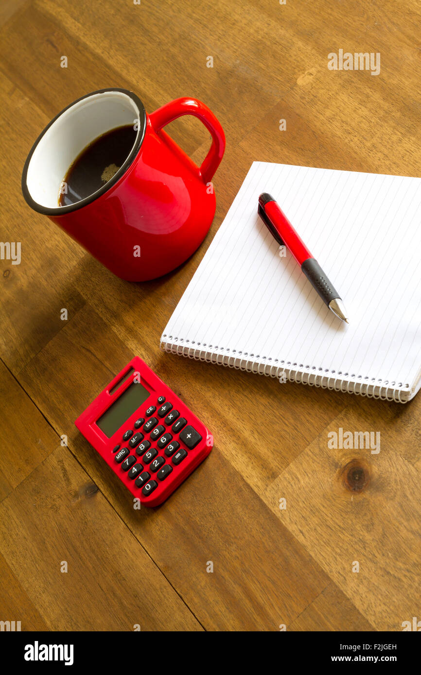 Working, taking notes and doing calculations Stock Photo - Alamy