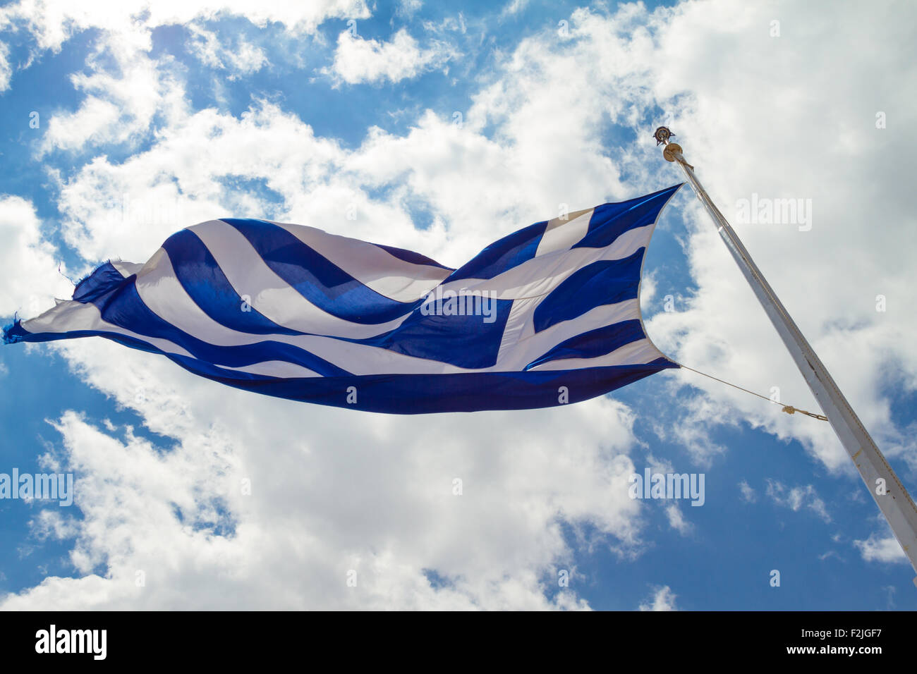Greek flag waving in the sky Stock Photo - Alamy