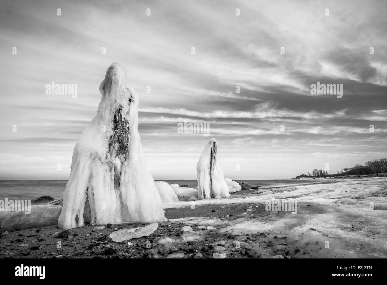 Frozen ice on the shore at winter Black and White Stock Photos & Images ...