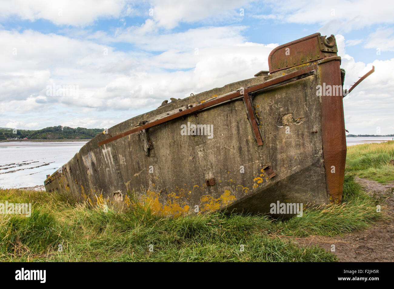 Abandoned boats at Purton ship graveyard on the bank of the river ...