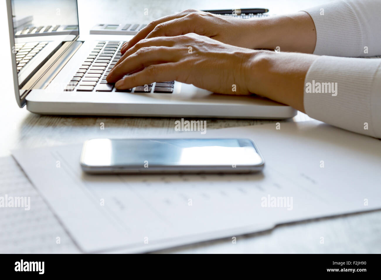 Working at the office with the computer Stock Photo - Alamy