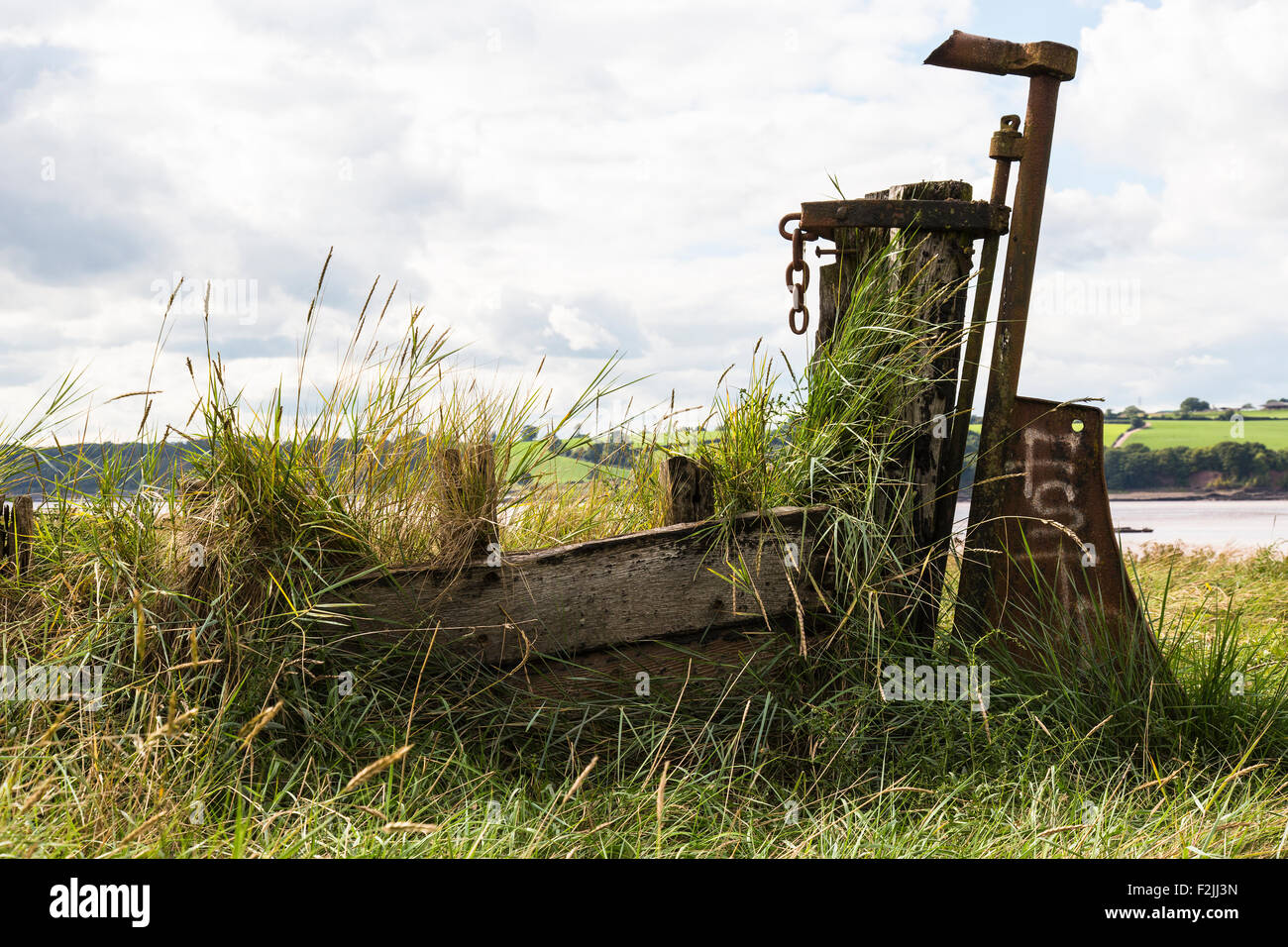 Abandoned boats at Purton ship graveyard on the bank of the river ...