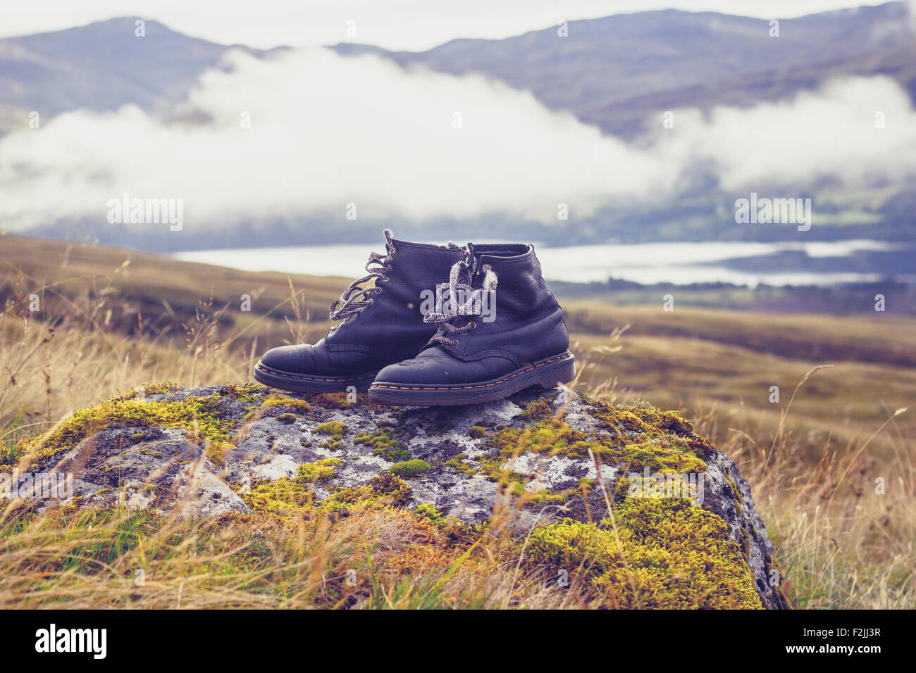 Pair of boots in nature Stock Photo - Alamy