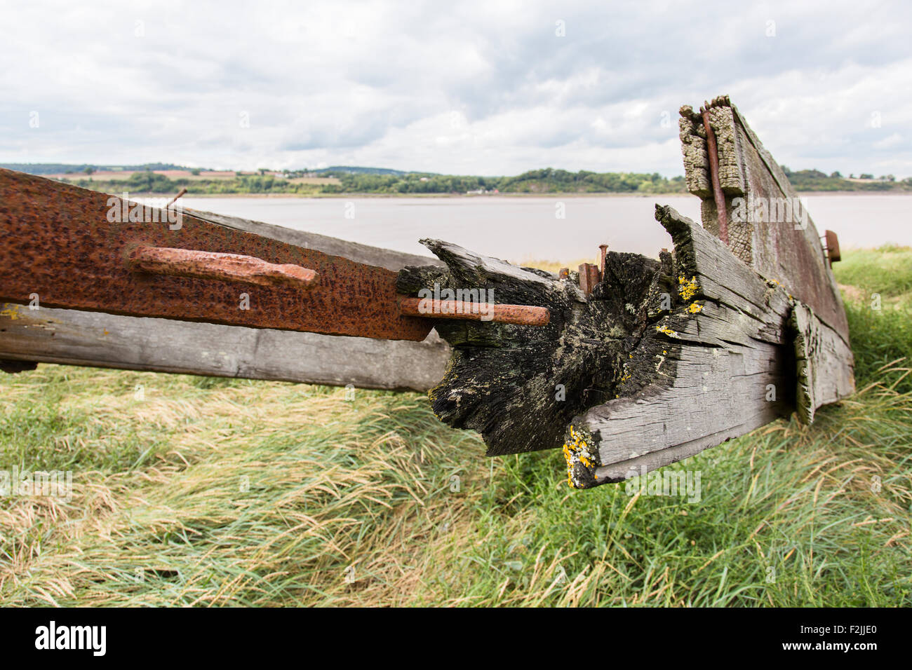 Abandoned boats at Purton ship graveyard on the bank of the river ...