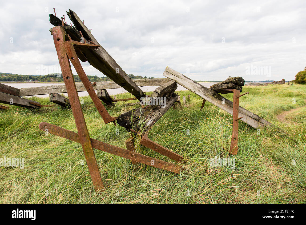 Abandoned boats at Purton ship graveyard on the bank of the river ...