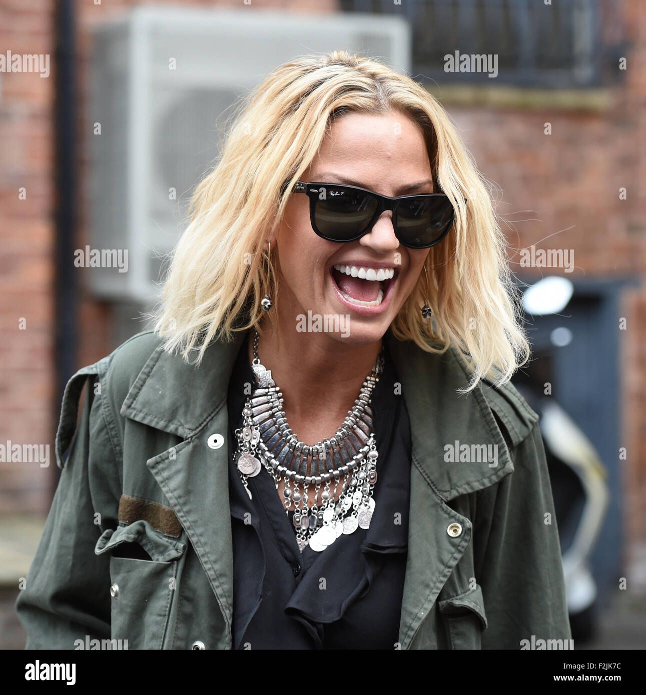 Sarah Harding posing for pictures with fans as she leaves Imagine FM ...