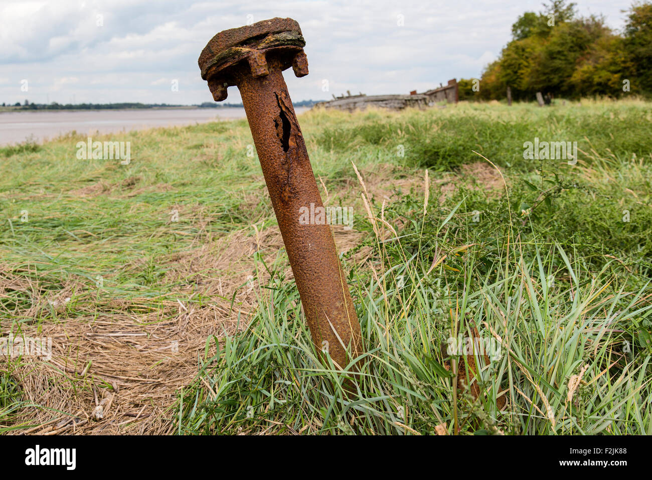 Abandoned boats at Purton ship graveyard on the bank of the river ...