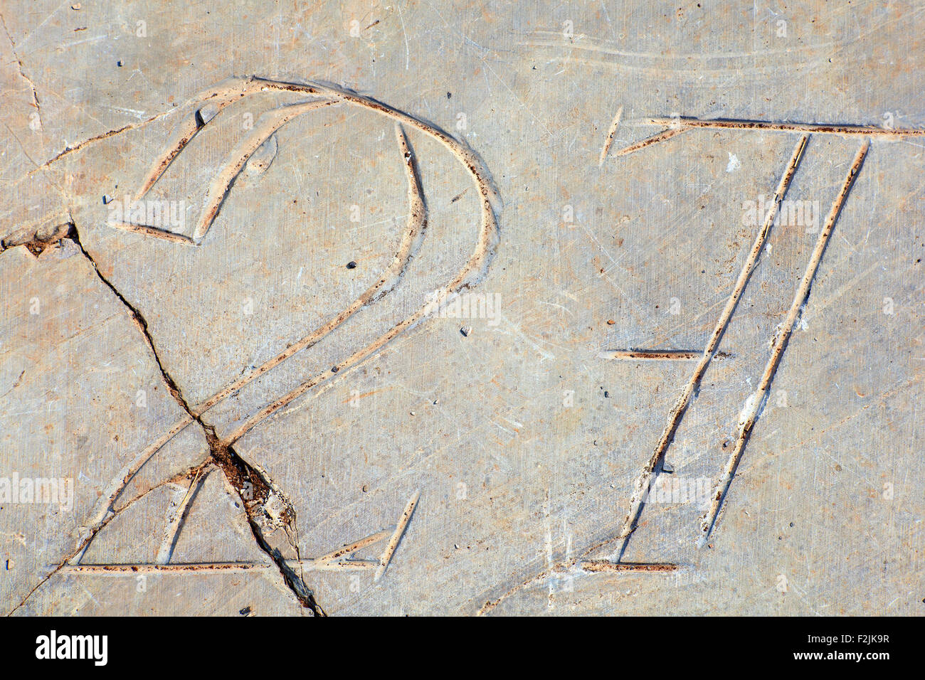 Photo of Numbers twenty-seven etched in stone Stock Photo - Alamy
