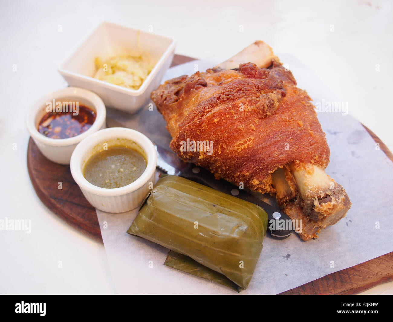 German fried pork leg Stock Photo - Alamy