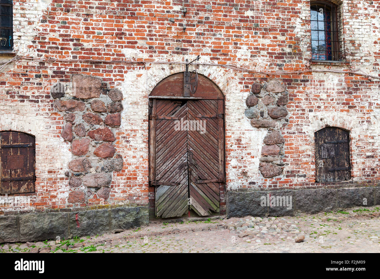 Old wooden gate at the medieval castle in Vyborg, Russia Stock Photo ...