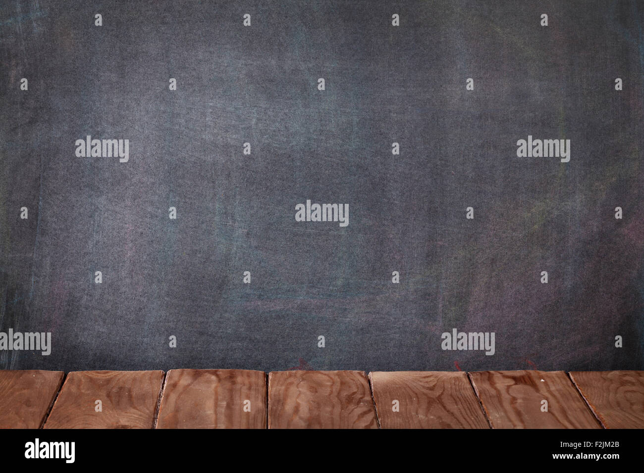 Classroom table in front of blackboard. View with copy space Stock ...