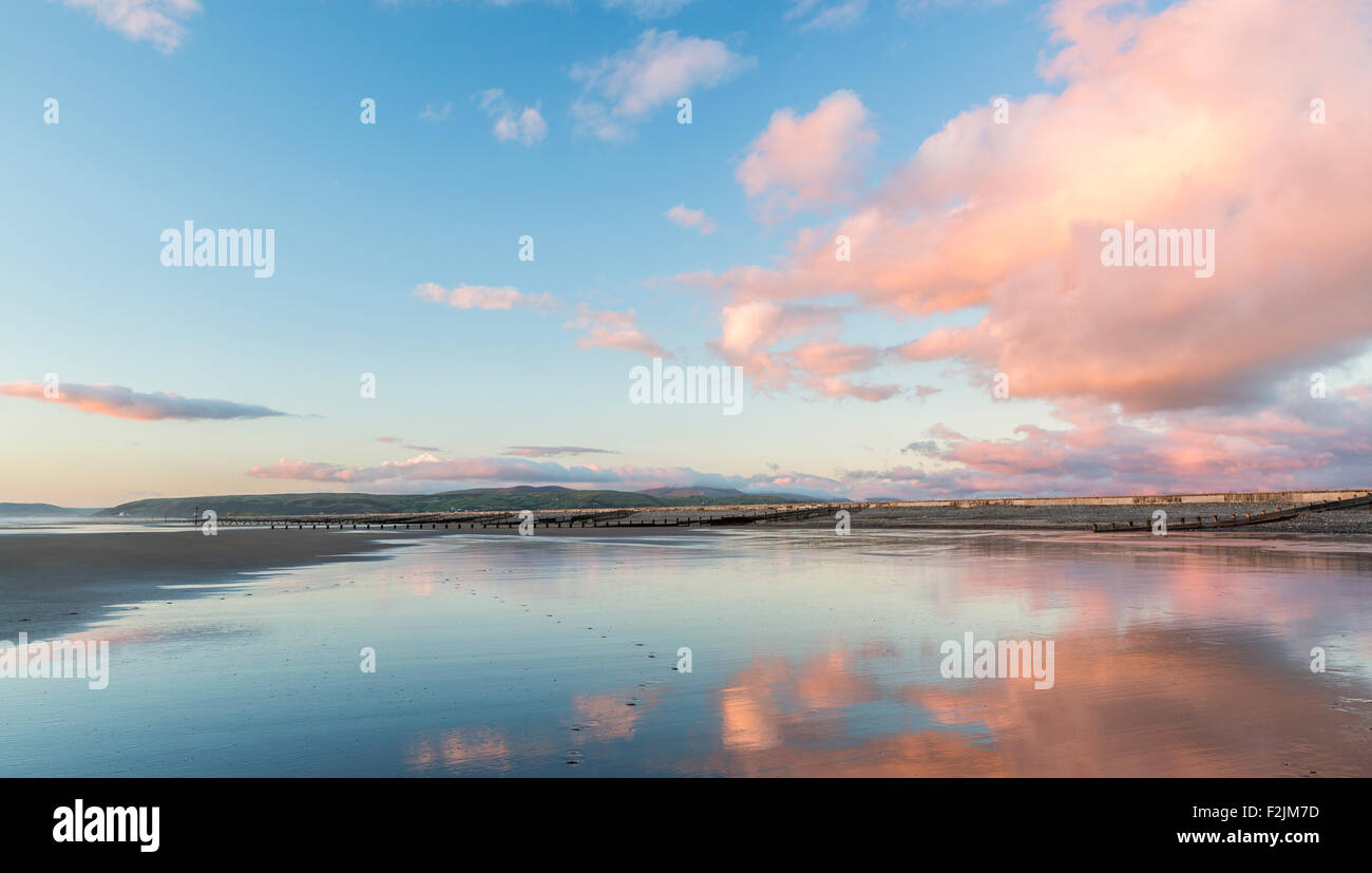 Reflections at Borth at low tide Stock Photo - Alamy