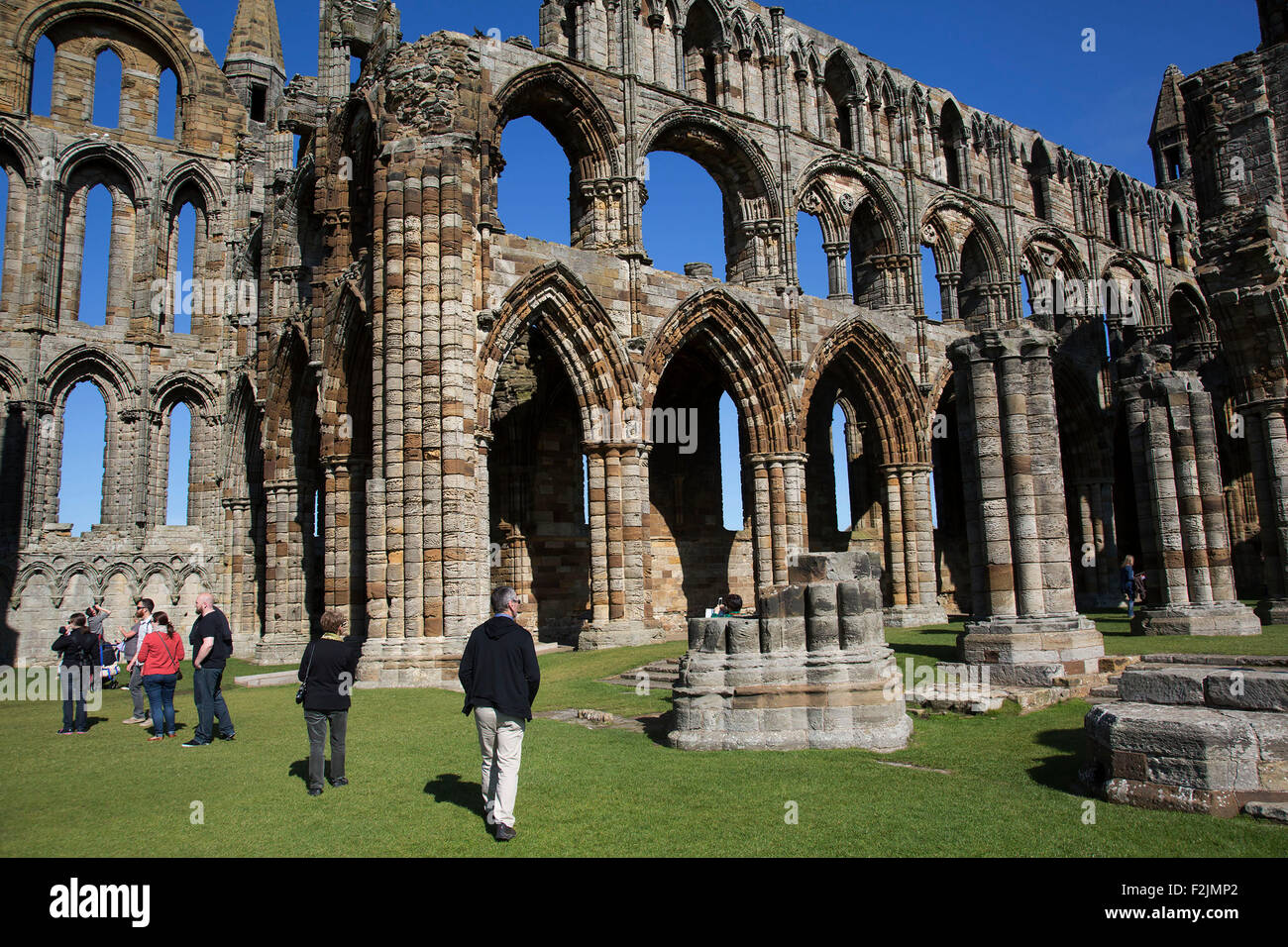Whitby Abbey is a ruined Benedictine abbey on the East Cliff above ...