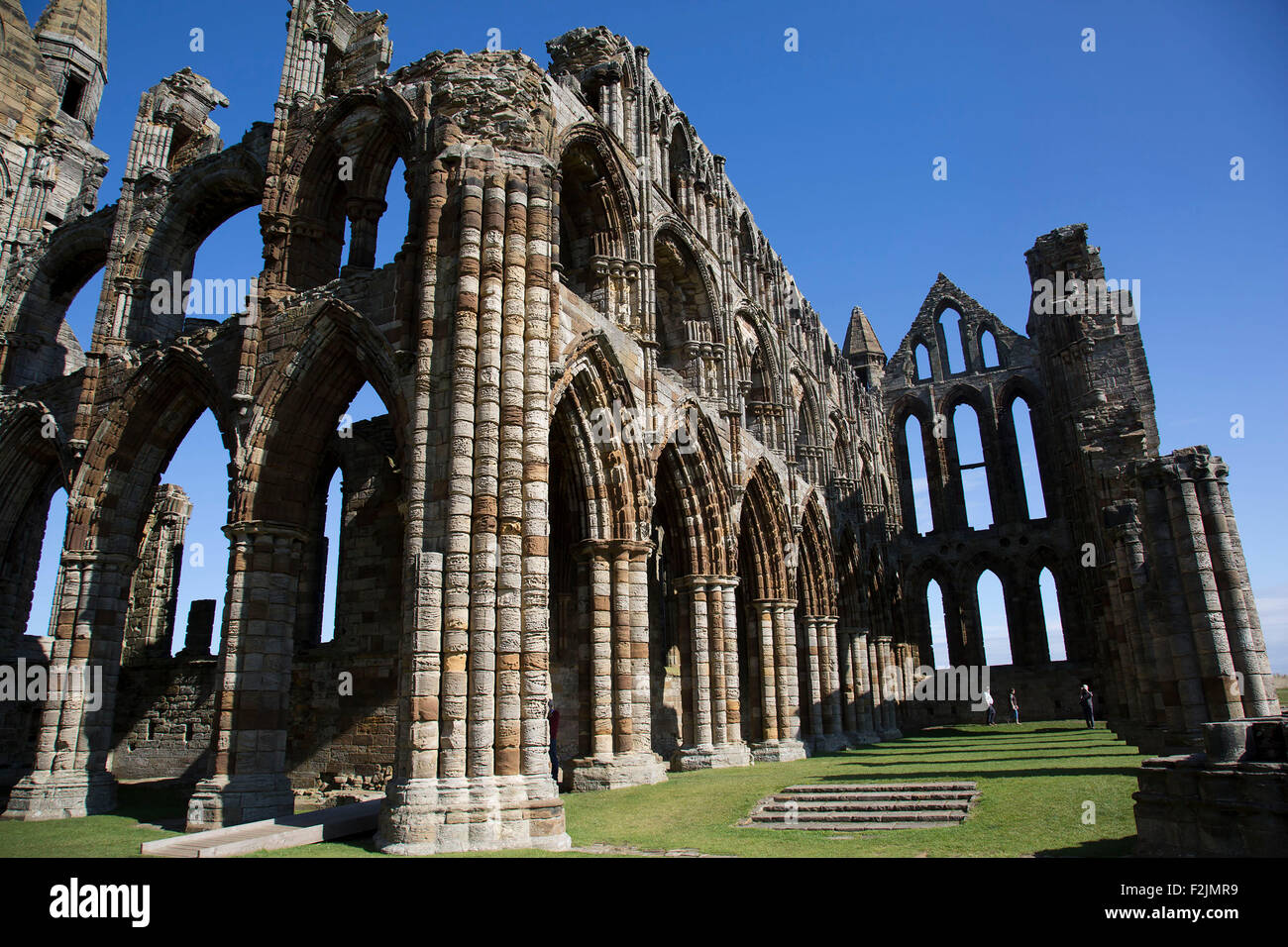 Whitby Abbey is a ruined Benedictine abbey on the East Cliff above ...