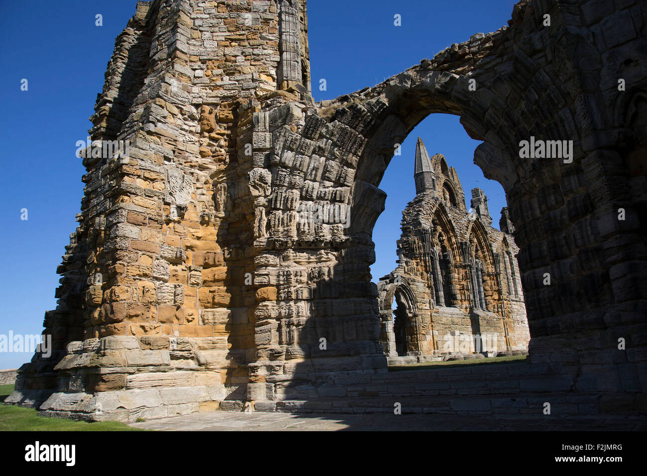 Whitby Abbey is a ruined Benedictine abbey on the East Cliff above ...